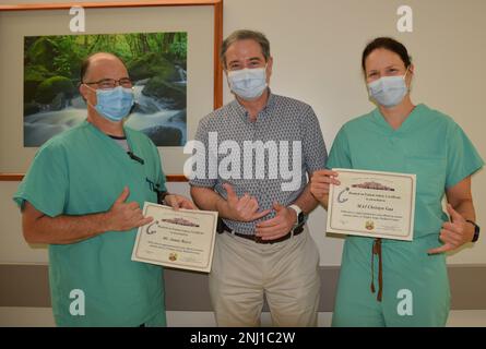Dr. Sean Harap, Deputy Commander Quality and Safety (center), presented ...