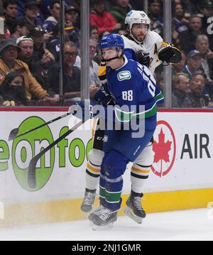 Vancouver Canucks' Nils Aman (88) celebrates with teammates after ...