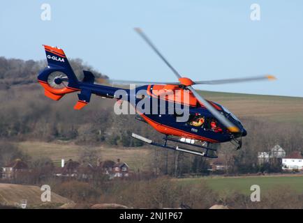 A Eurocopter EC 135T2+ helicopter of PDG Helicopters departing Brighton ...
