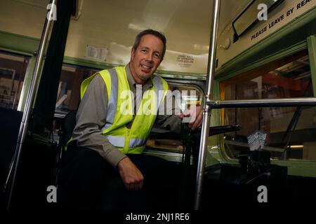 Superintendent of bus maintenance Louis Guzzo shows historic buses ...
