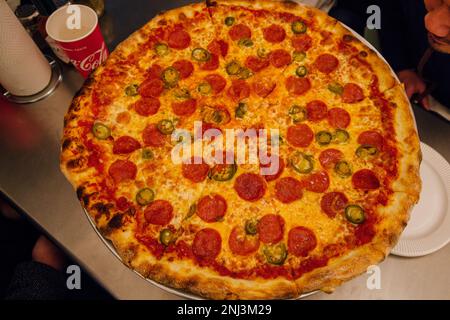 Henry s PIZZA a New York style pizzeria by artist VERDY in Osaka Japan in February 2023 Stock Photo Alamy