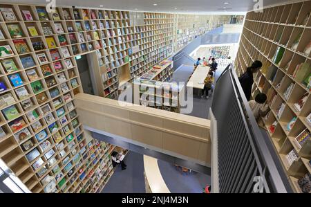 A photo shows a library "Kobe Children's Book Forest" designed by Tadao ...