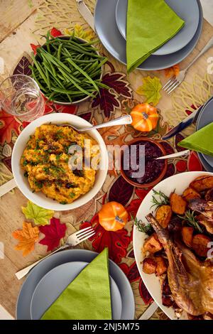 Overhead view of thanksgiving table roast turkey, vegetables and copy ...