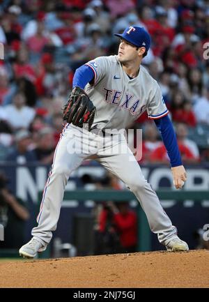 Texas Rangers pitcher Cole Ragans signals to the catcher during the ...