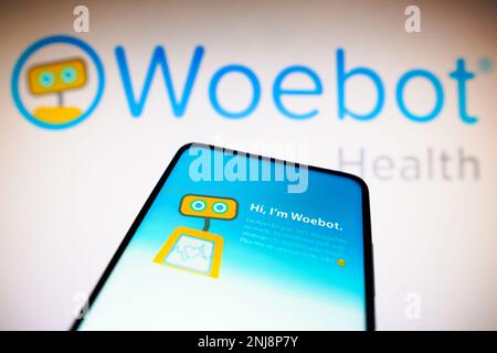 In this photo illustration the Woebot Health logo seen displayed on a ...