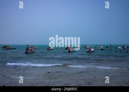 Boats anchored in Persian gulf at Manama in the Kingdom of Bahrain ...