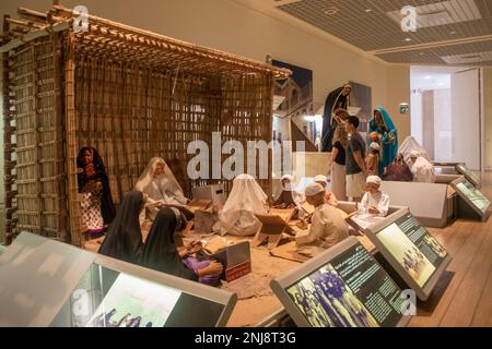A gallery of Bahrain National Museum. Exhibit shows a traditional life ...