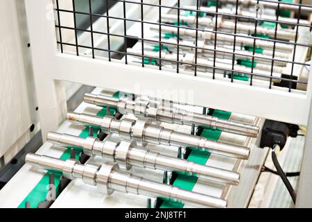 The machining metal parts in conveyor ; selective focus Stock Photo - Alamy