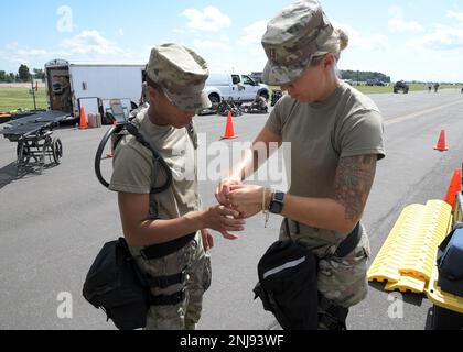 U.S. Air Force Capt. Melissa Cecil, a Mission Sustainment Team member ...