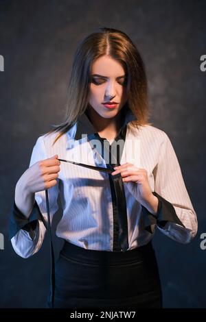 woman teach learn knot a tie helpful tutorial Stock Photo - Alamy