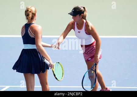 Natalie Block and Piper Charney react during a junior girls' doubles ...