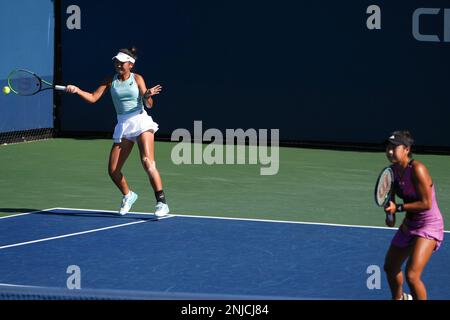 Katherine Hui and Eleana Yu in action during a junior girls' doubles ...