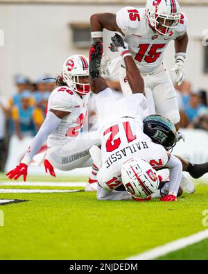 Western Kentucky defensive back Kahlef Hailassie (12) celebrates ...