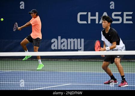 Aidan Kim and Learner Tien during a junior boys' doubles match at the ...