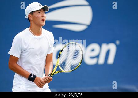 Kyle Kang in action during a junior boys' singles match at the 2022 US ...