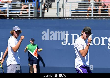 Sebastian Gorzny and Alex Michelsen react during a men's doubles match ...