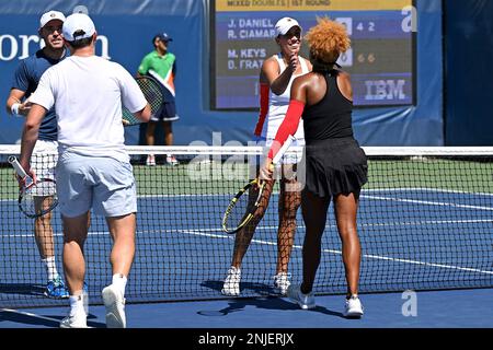 Madison Keys and Bjorn Fratangelo react during a mixed doubles match at ...