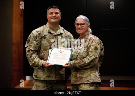 Chief Warrant Officer (4) Peggy Bates gives her remarks during her ...