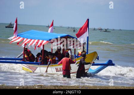 People vacation on Gemah Beach, Tulung Agung, East Java Indonesia Stock ...
