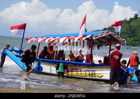 People vacation on Gemah Beach, Tulung Agung, East Java Indonesia Stock ...