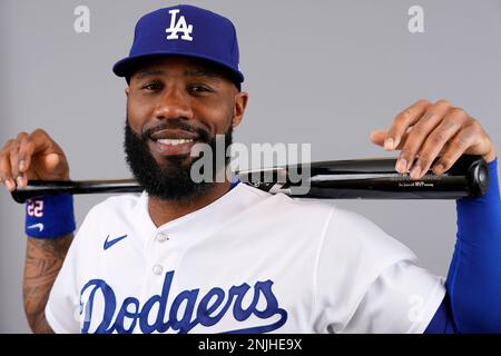 Los Angeles Dodgers' Jason Heyward is high-fived in the dugout after ...