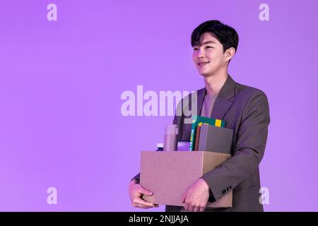 handsome Korean young man quitting job Stock Photo - Alamy