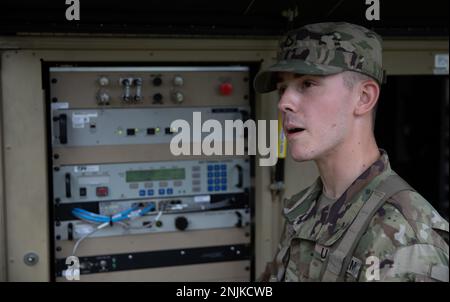 Pfc. Lawson Graham, 115th Signal Battalion, operates a generator while ...