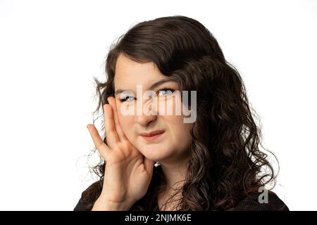 Young lady scrunching her nose, isolated on white background Stock ...