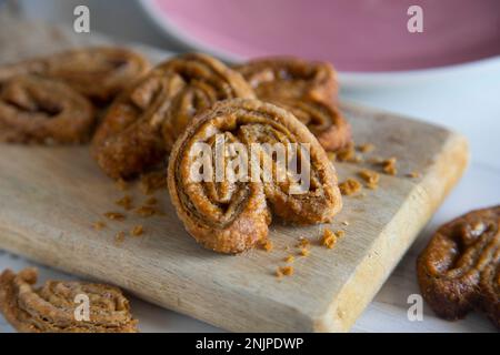 The palmera, palmerita, oreja, orejita, palmita or puff pastry heart is ...