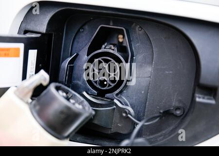 Type 2 CCS plug port on electric vehicle. DC - CCS type 2 EV charging ...