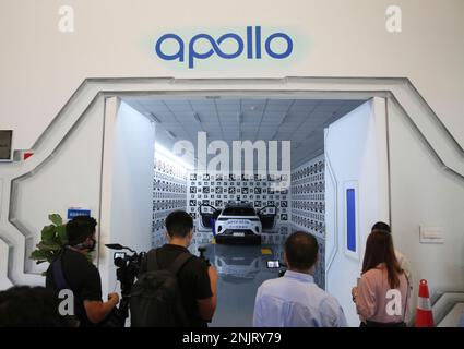 A self-driving taxi "Robotaxi" of Baidu is driven at Baidu Apollo Park ...