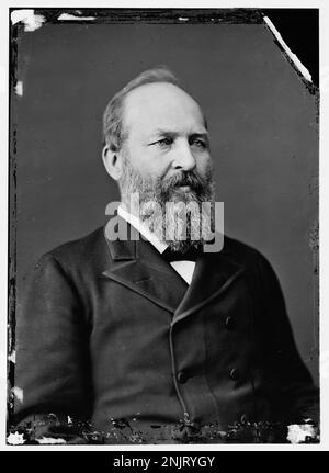 This image shows President James A. Garfield with his family ...