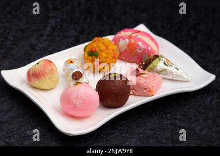 Variety Of Assorted Desi Ghee Indian Mithai viz. Laddu, Kesar Barfi ...