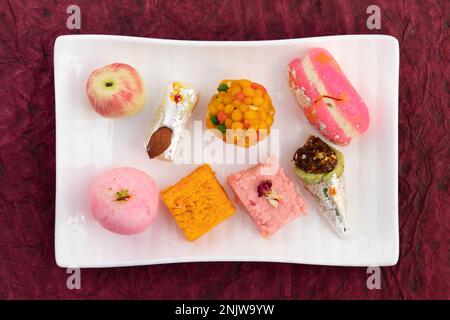 Variety Of Assorted Desi Ghee Indian Mithai viz. Laddu, Kesar Barfi ...