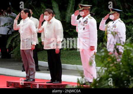 Incoming Philippine president Ferdinand Marcos Jr., left, and outgoing ...