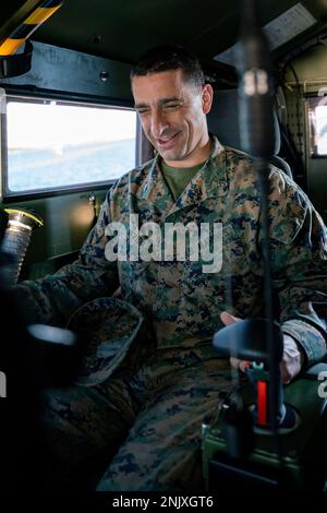 Col. Paul Merida, left, the 22nd Marine Expeditionary Unit’s commanding ...