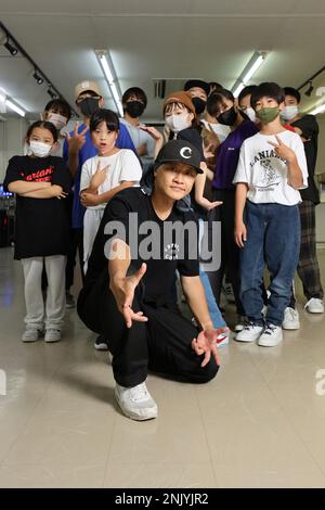 Japanese top breakdancer Katsuyuki Ishikawa, wearing a cap, performs ...