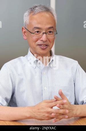 Japanese physicist Yasunobu Nakamura poses for photo during an ...