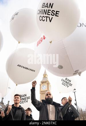 Protesters from the Big Brother Watch lobby group hold large white ...