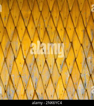 Yellow wooden tiling rough rustic background. Tonned, vertical Stock ...