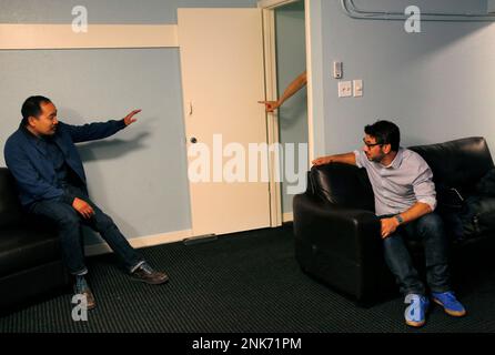 Matt Lieb, center, host and comedian, keeps his eye on backstage before ...