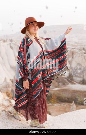 Woman outdoor wearing beautiful boho style earring Stock Photo - Alamy