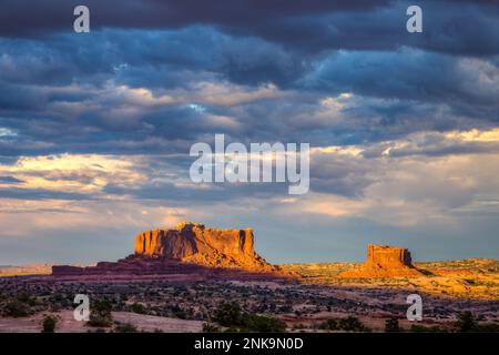 Storm clouds over the Monitor and Merrimac Buttes at sunset near Moab ...