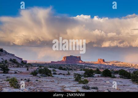 Storm clouds over the Monitor and Merrimac Buttes at sunset near Moab ...
