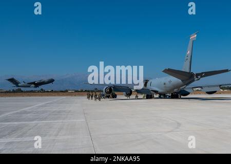 Airmen from the 763rd Expeditionary Reconnaissance Squadron stand in ...
