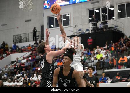 Stranahan's Jaquan Adams (5) goes up for a shot in front of St ...