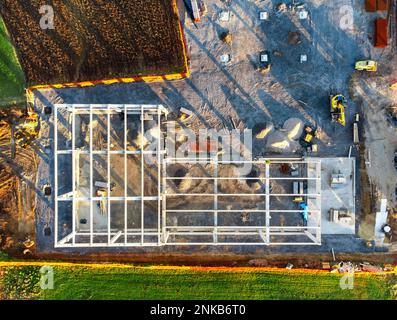 Prefabricated concrete skeleton frame building being constructed, building site. Shot with a ...