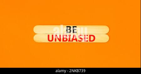 Be unbiased symbol. Concept words Be unbiased on wooden block ...