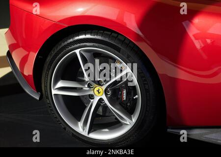The rear wheel of a red Ferrari 296 GTB. Tire Michelin Pilot Sport 4 S ...