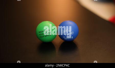 Stress Ball showing daily motivational messages stress less Stock Photo ...